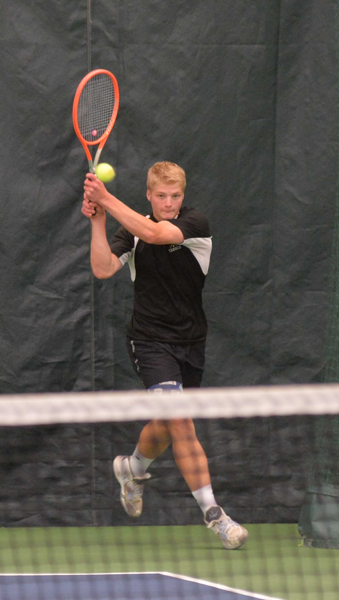 Casey Duncan returns a backhand shot for the Eagles. (Paula Roberts ...
